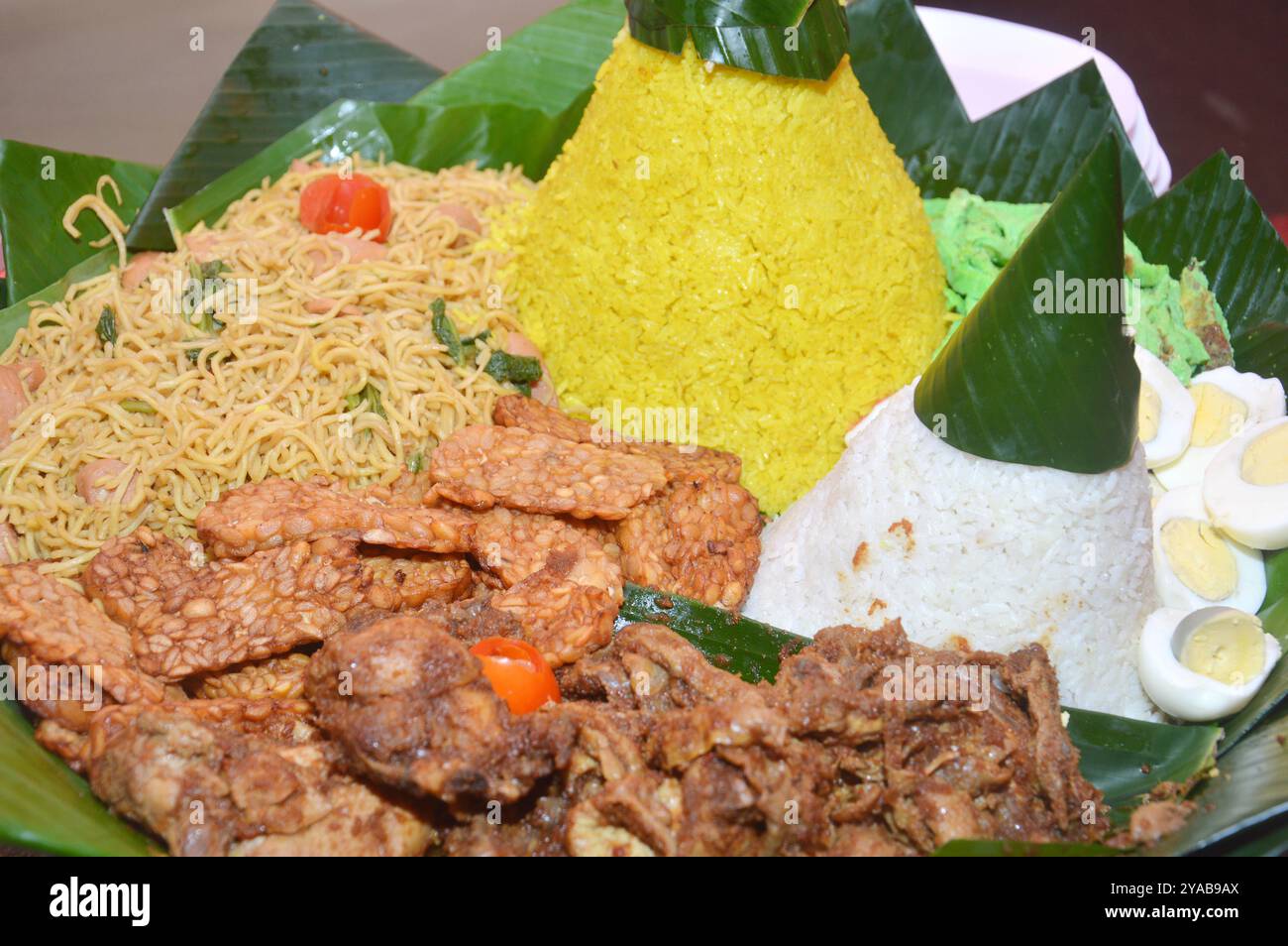 nasi tumpeng, traditional Javanese food, complete food with side dishes ...