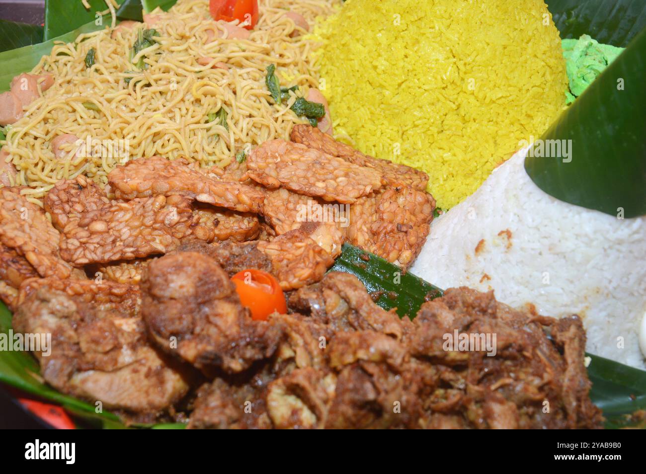 nasi tumpeng, traditional Javanese food, complete food with side dishes ...