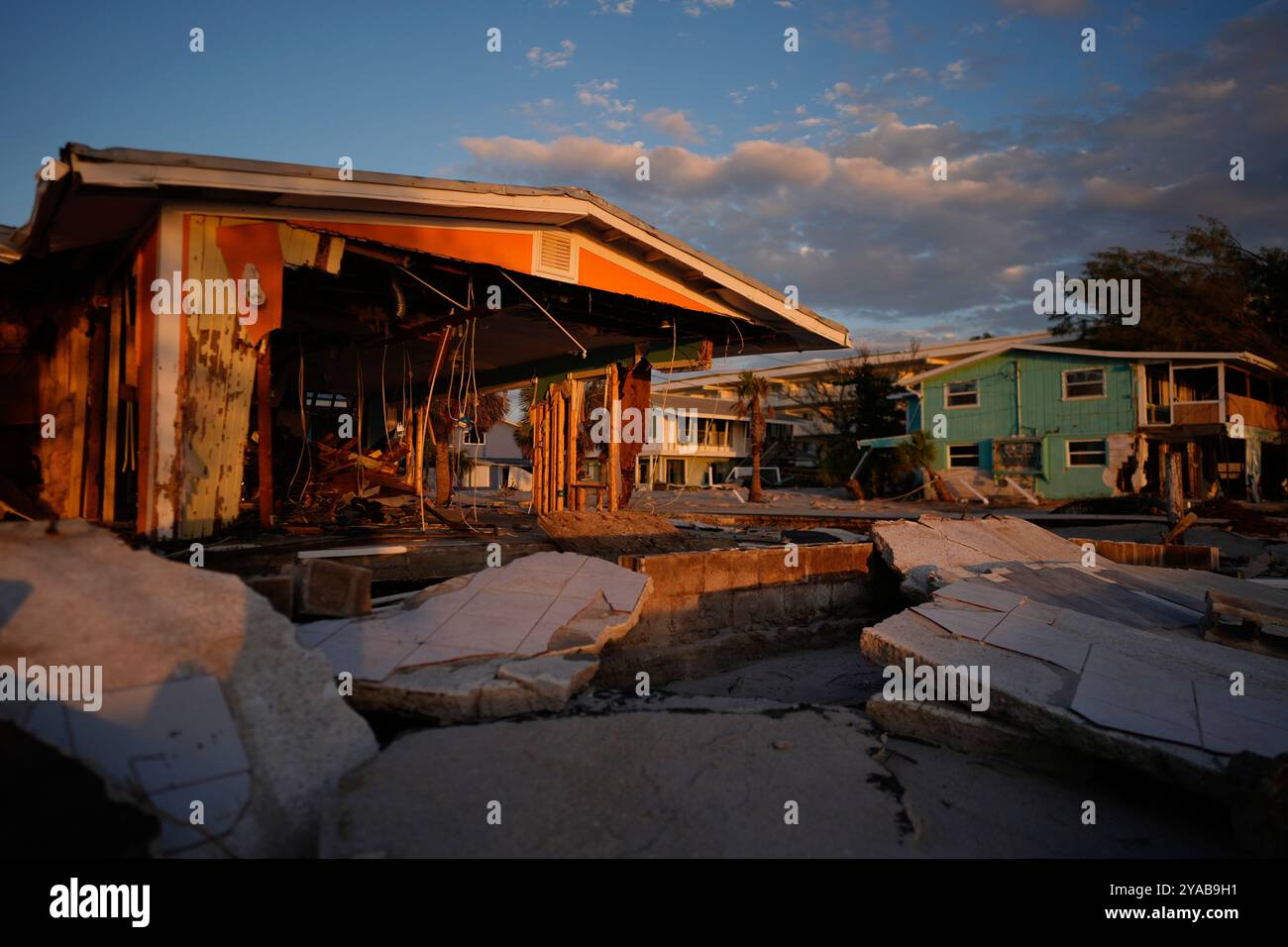 Buildings destroyed by Hurricane Milton are seen along side the broken ...