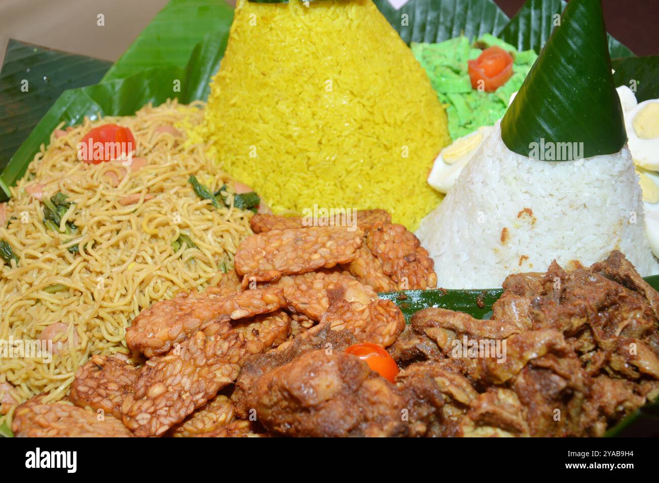 nasi tumpeng, traditional Javanese food, complete food with side dishes ...