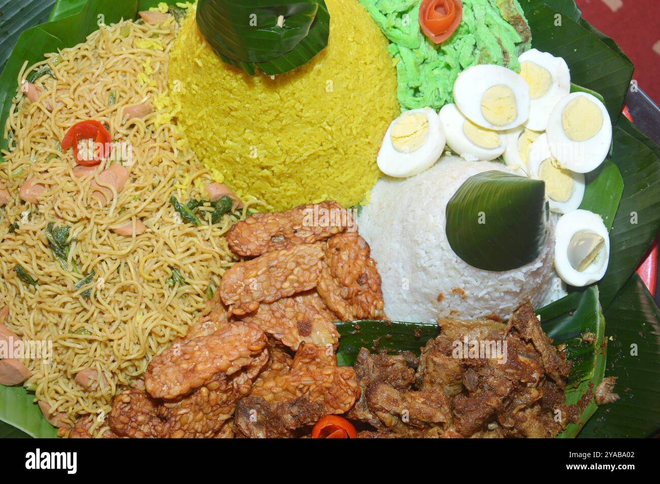 nasi tumpeng, traditional Javanese food, complete food with side dishes ...
