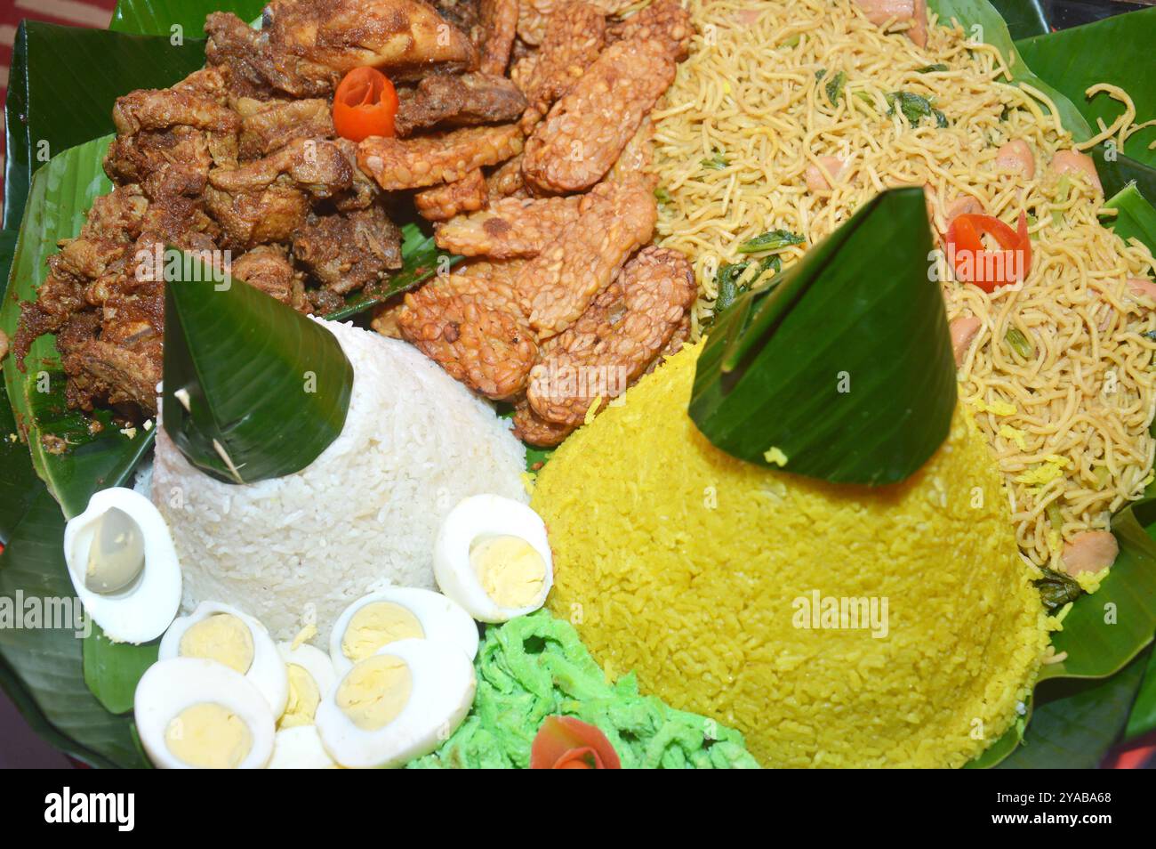nasi tumpeng, traditional Javanese food, complete food with side dishes ...