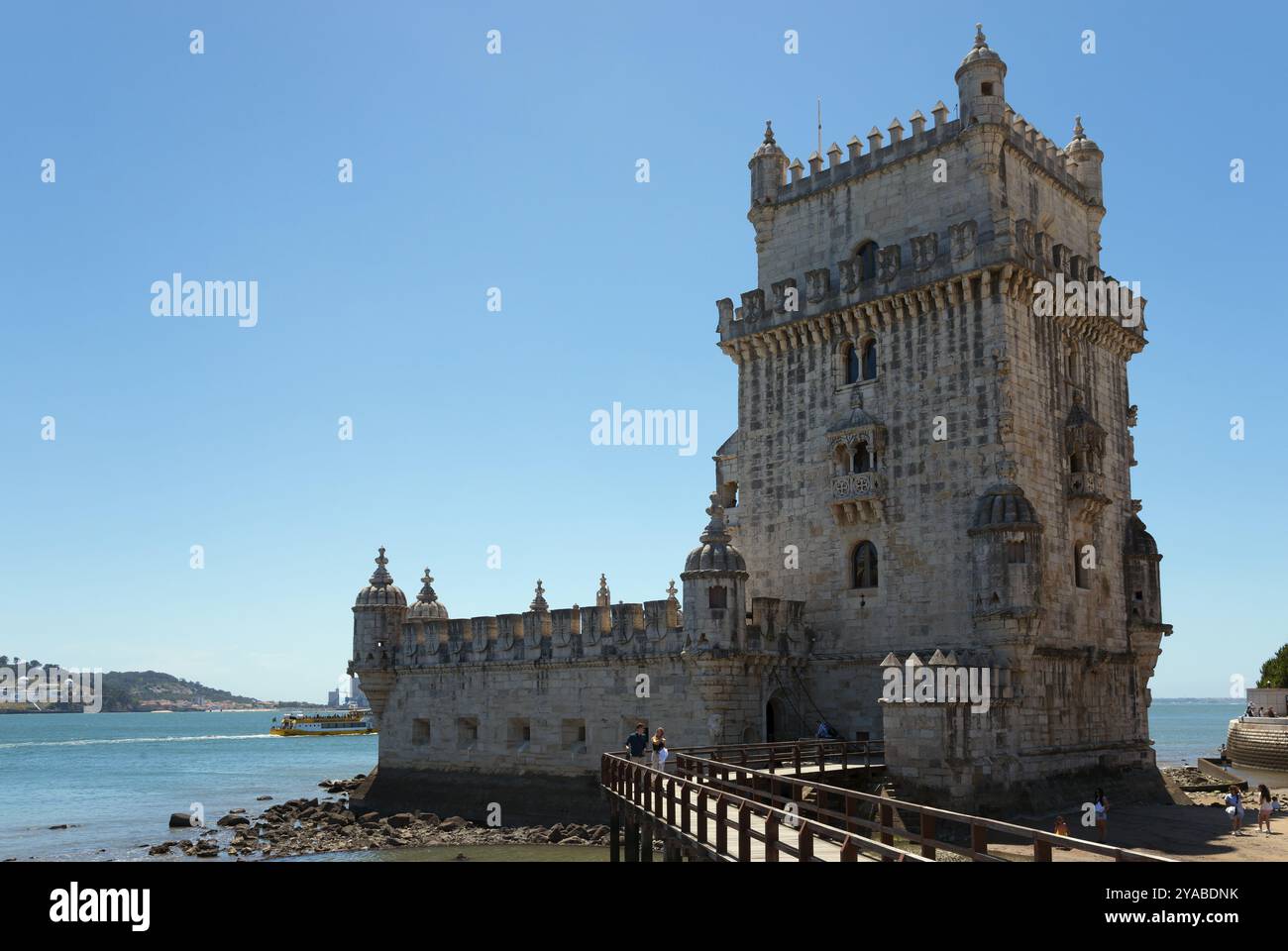 Historic tower with access bridge, blue sky in the background, Torre de ...