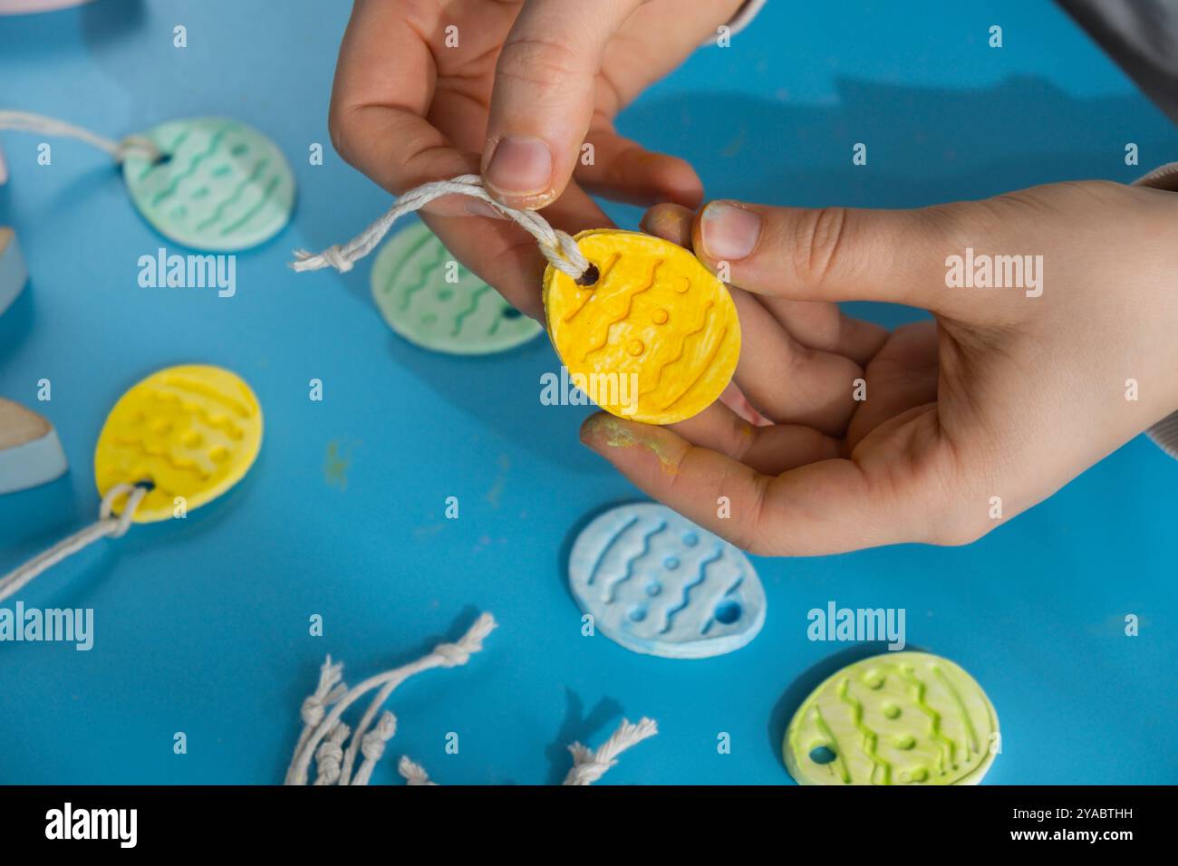 Creator is using white air dry clay for making decor to EASTER holiday ...