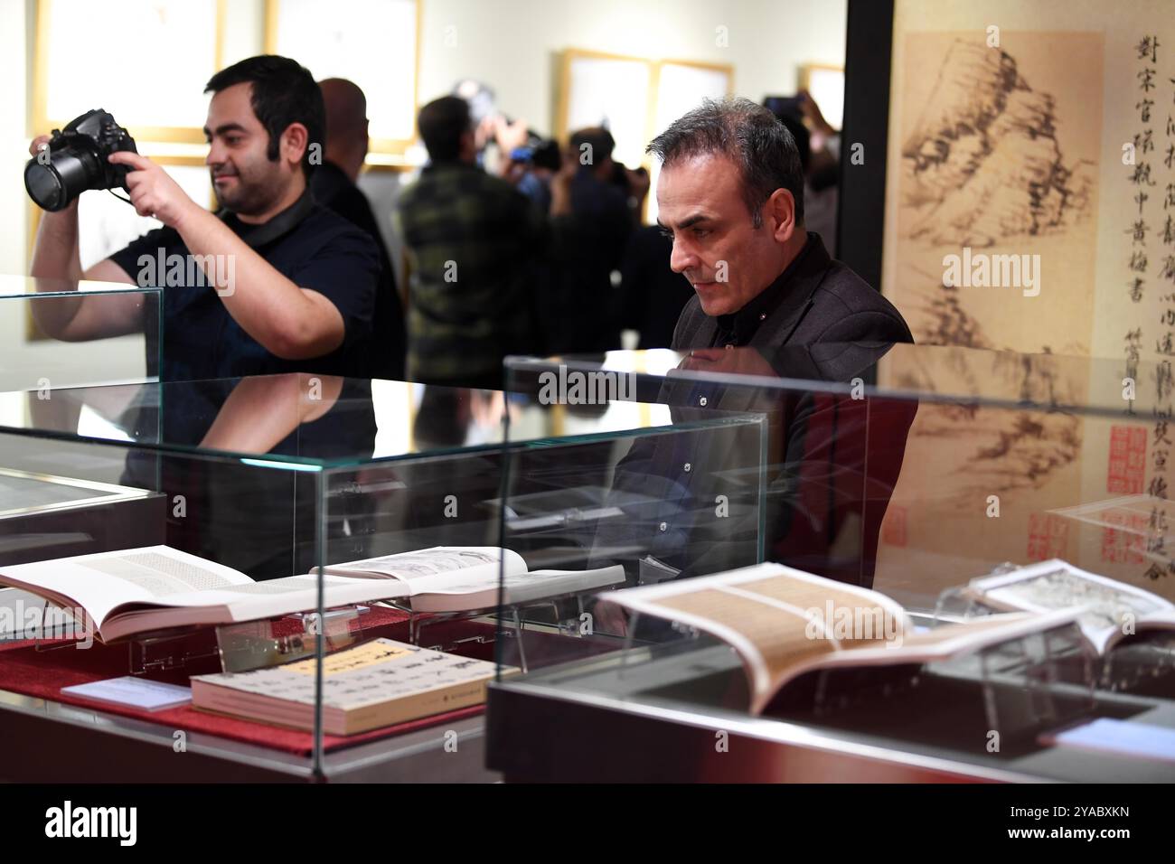 Tehran, Iran. 12th Oct, 2024. Visitors view an exhibition of selected ...
