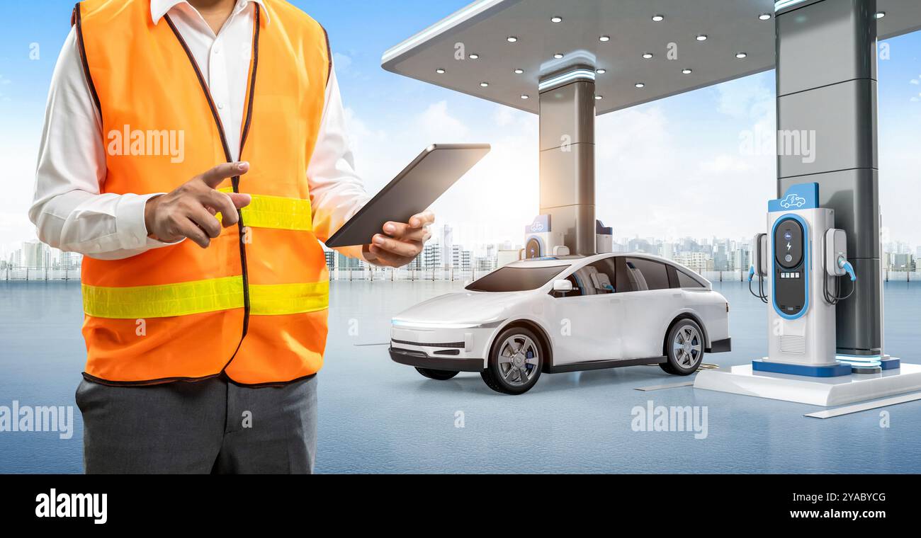 Asian engineer or technician with EV charging stations or electric ...
