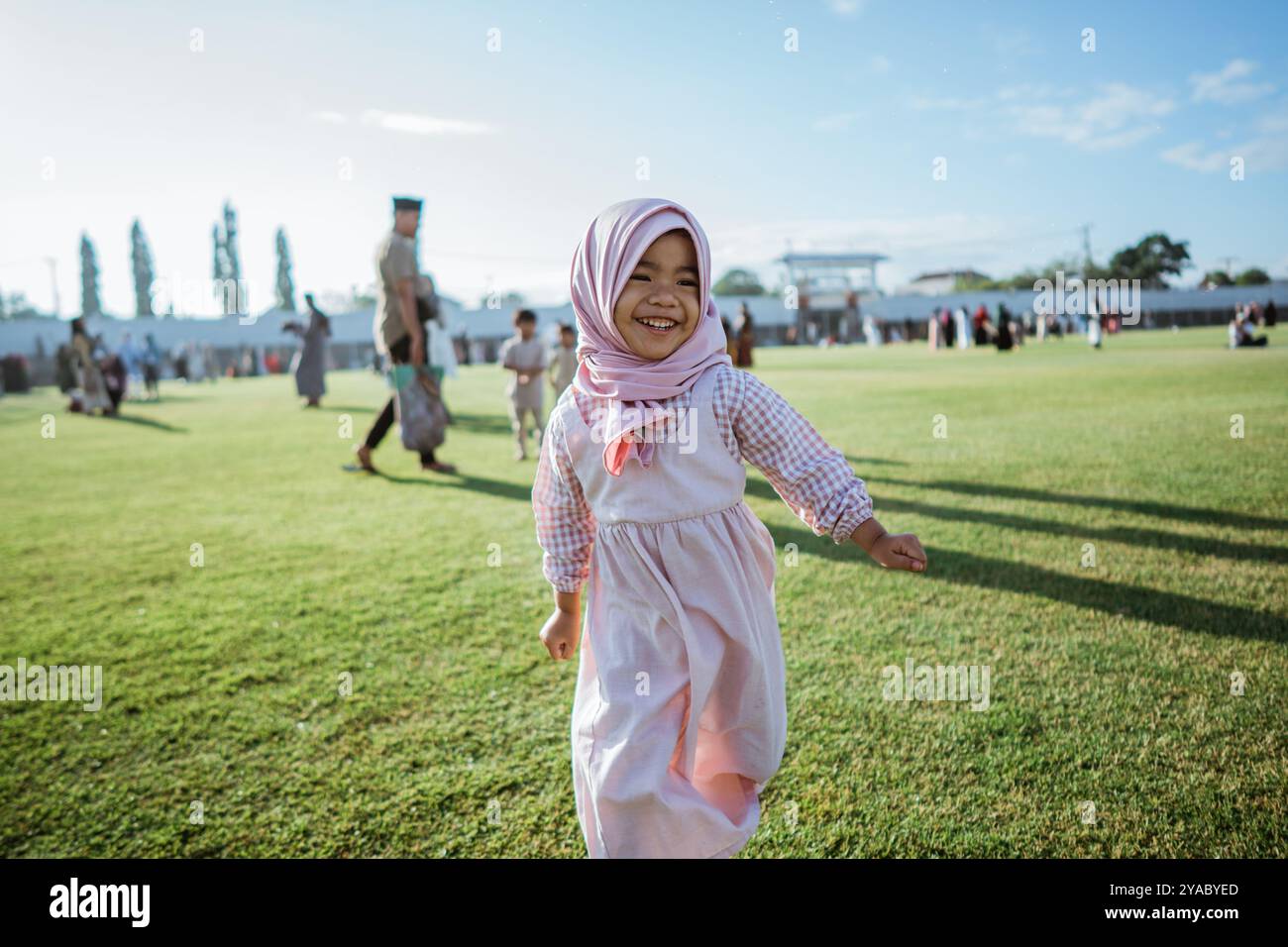 Vibrant traditional attire plays hi-res stock photography and images ...