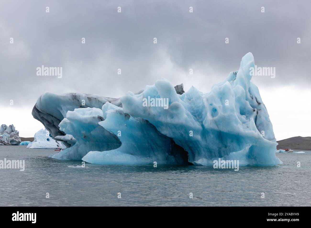 Iceberg swinging back and forth after breaking off Stock Photo - Alamy