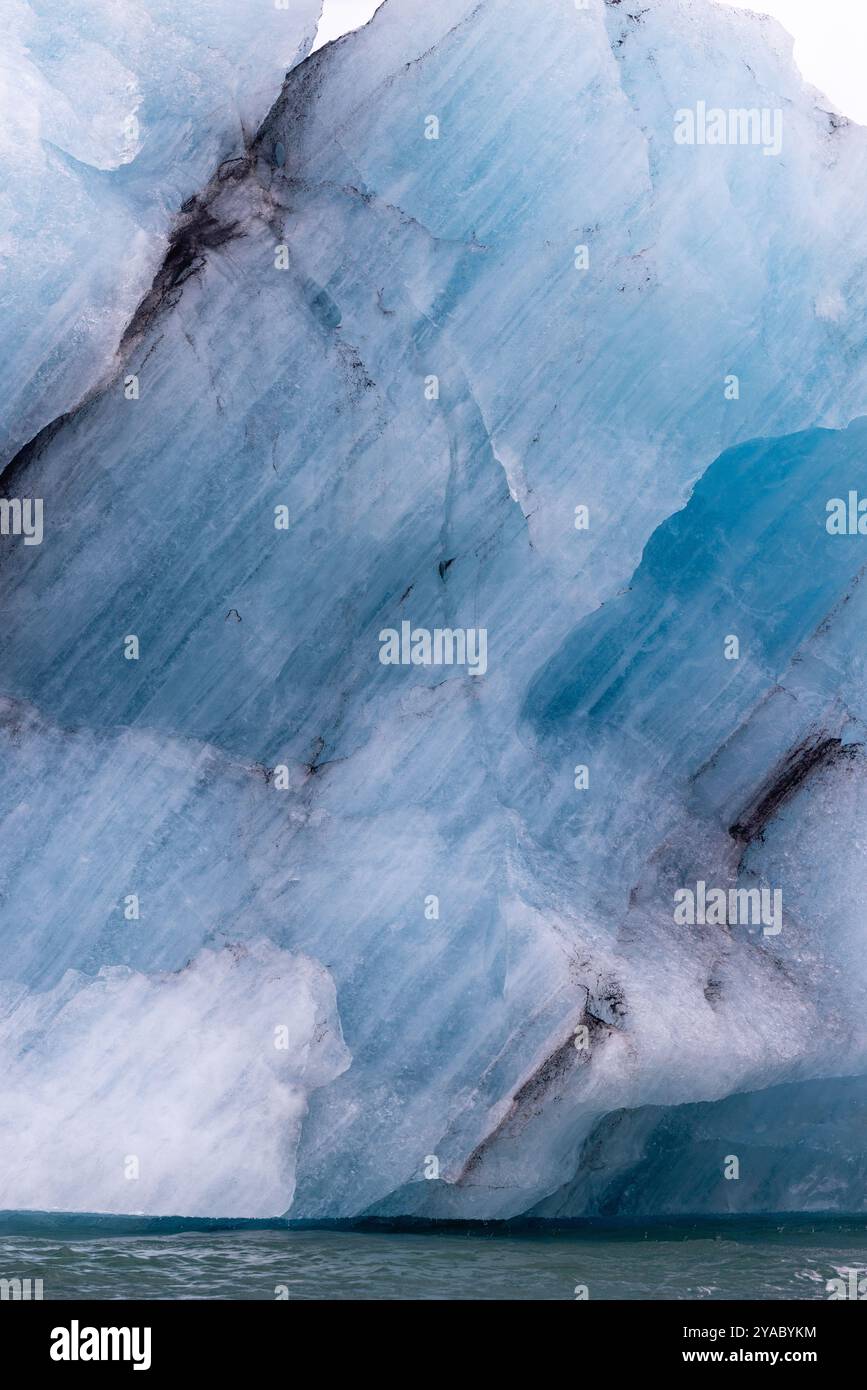 Iceberg swinging back and forth after breaking off Stock Photo - Alamy