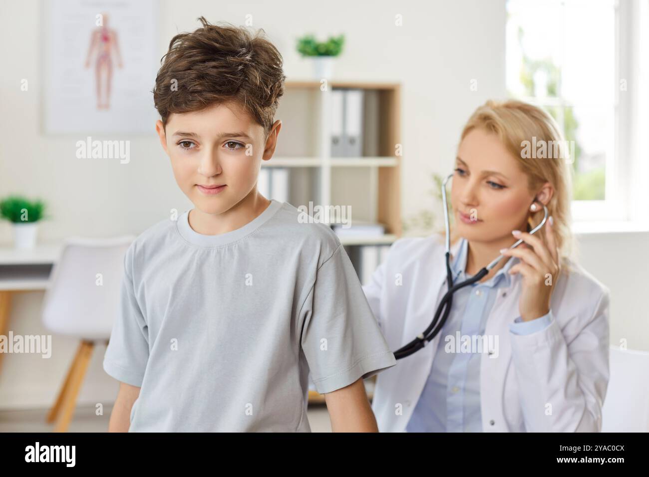 Teen boy doctor consultation clinic hi-res stock photography and images ...