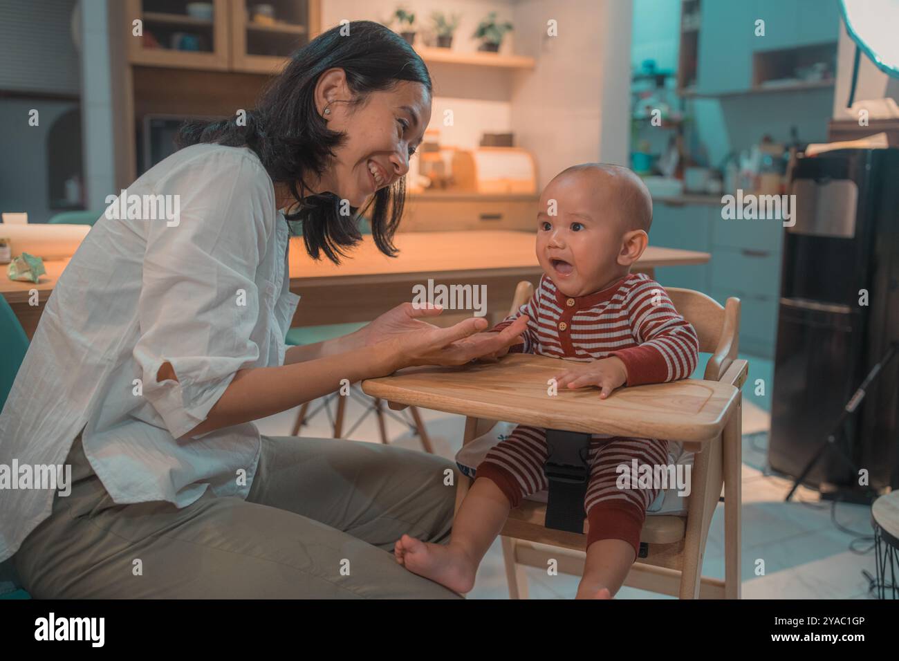 Joyful scene mother baby hi-res stock photography and images - Alamy
