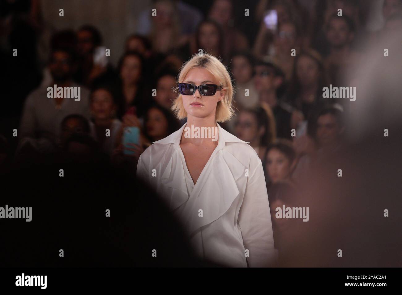 A model walks the runway during Ricardo Andrez fashion show at ...