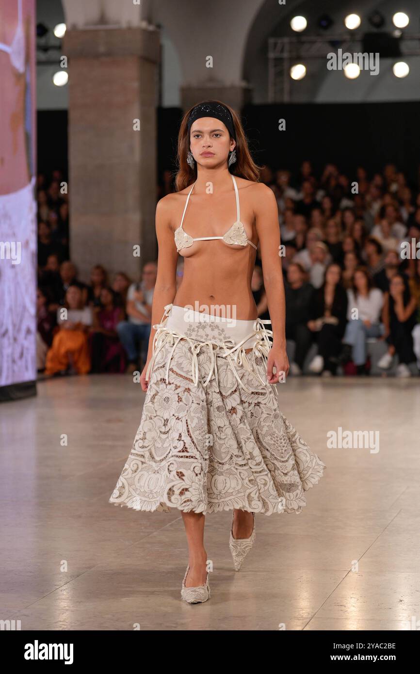 A model walks the runway during Behen fashion show at ModaLisboa Singular, Lisbon Fashion Week ...