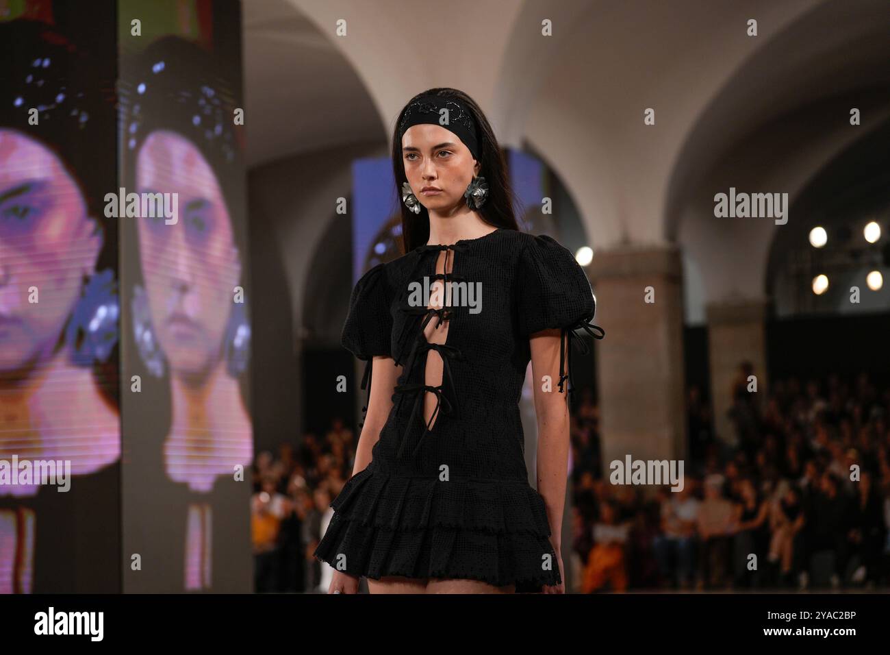 A model walks the runway during Behen fashion show at ModaLisboa ...
