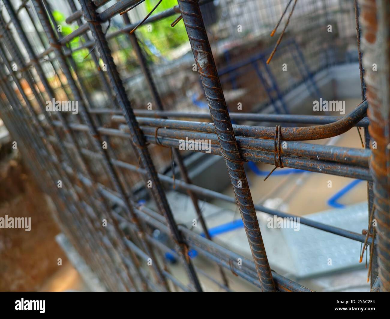 A construction site displaying a reinforced concrete foundation with ...