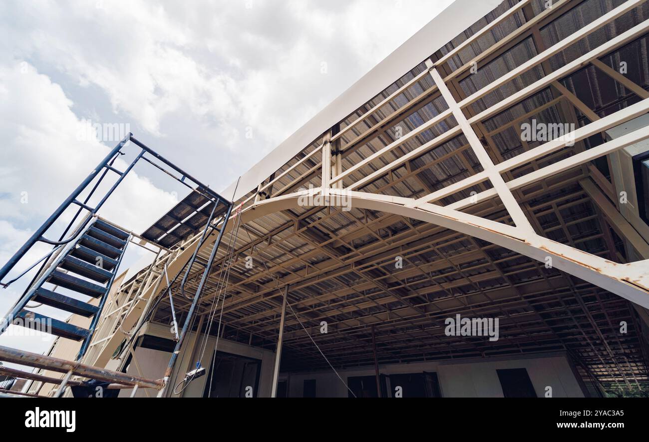 A structure featuring wooden slats on construction site contributing to ...