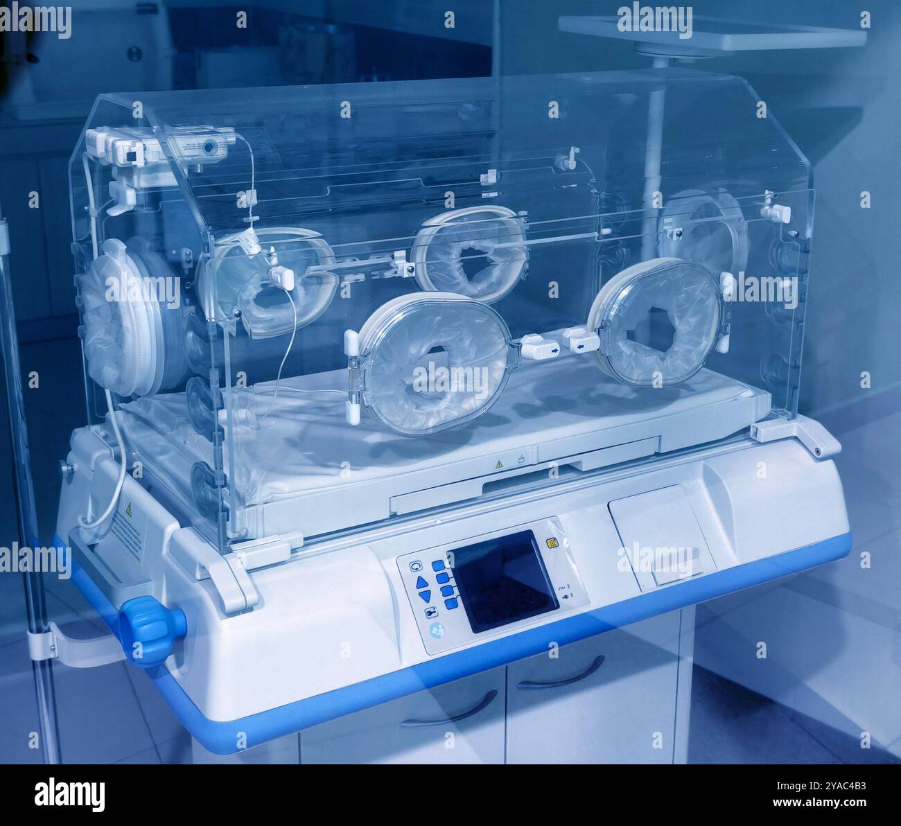 A baby incubator featuring a screen in hospital Stock Photo - Alamy
