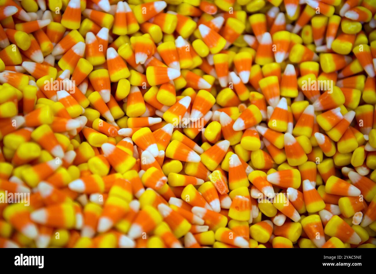 Close up of bulk Halloween candy corn Stock Photo - Alamy