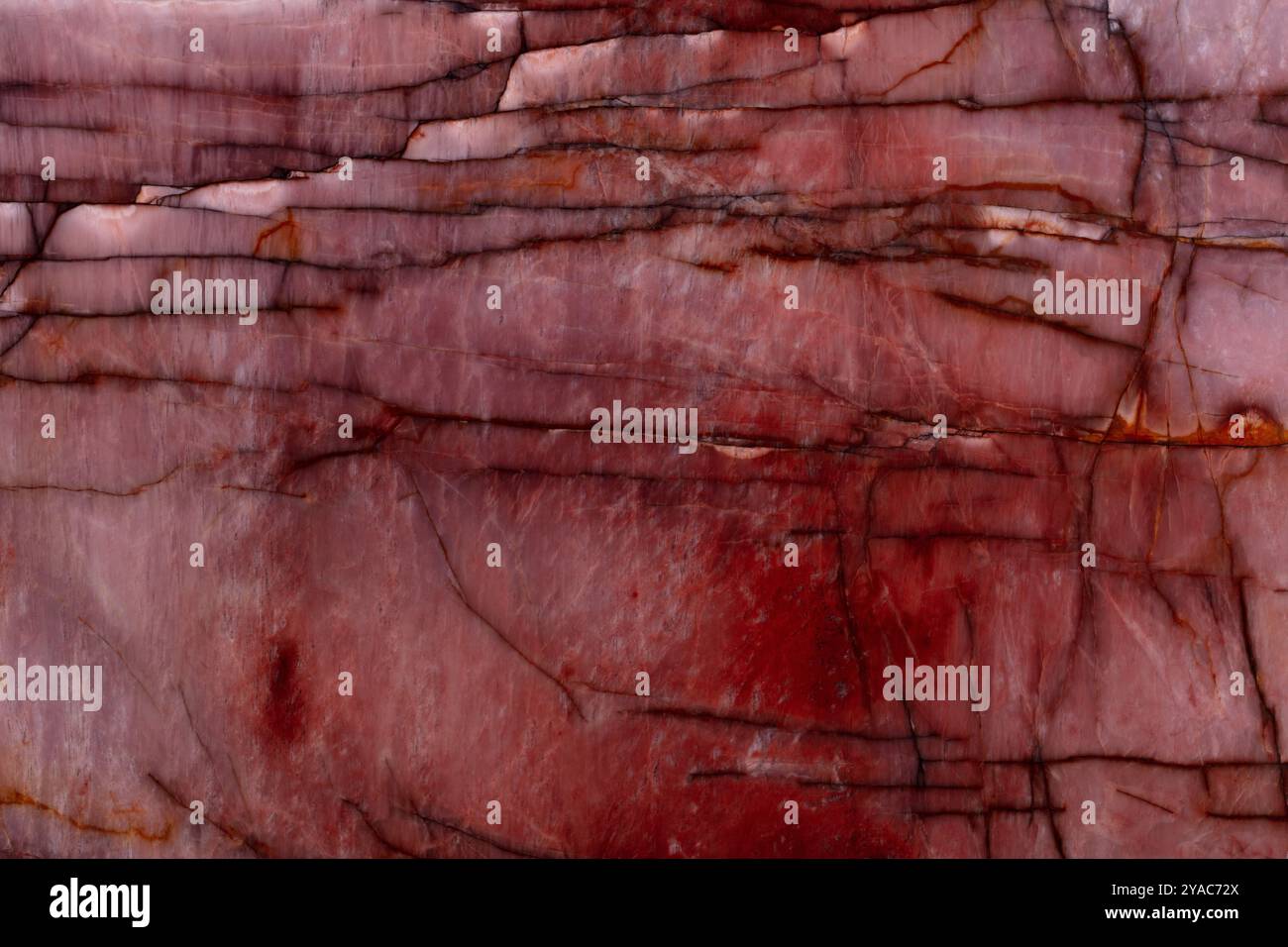 Natural quartzite background in strict red tone Stock Photo - Alamy