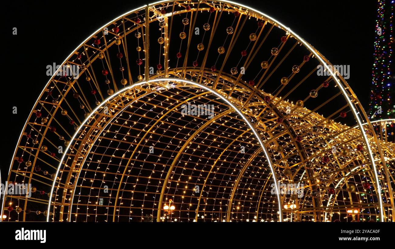 arch equipped with many yellow lights in the structure of the decor of ...