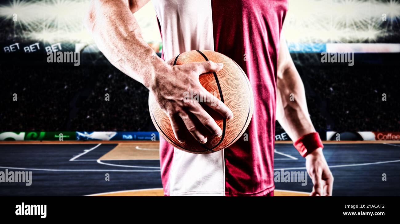 Basketball player against basketball court Stock Photo - Alamy