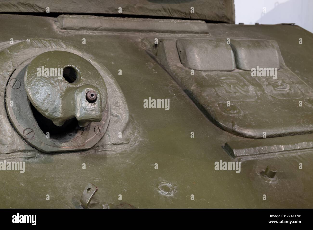 Front of a Soviet WW2 T34-85 tank showing machine gun mount and drivers ...