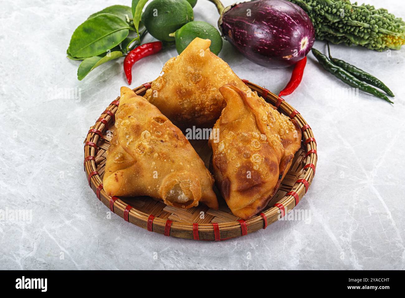 Indian cuisine - fries crispy stuffed samosa Stock Photo - Alamy