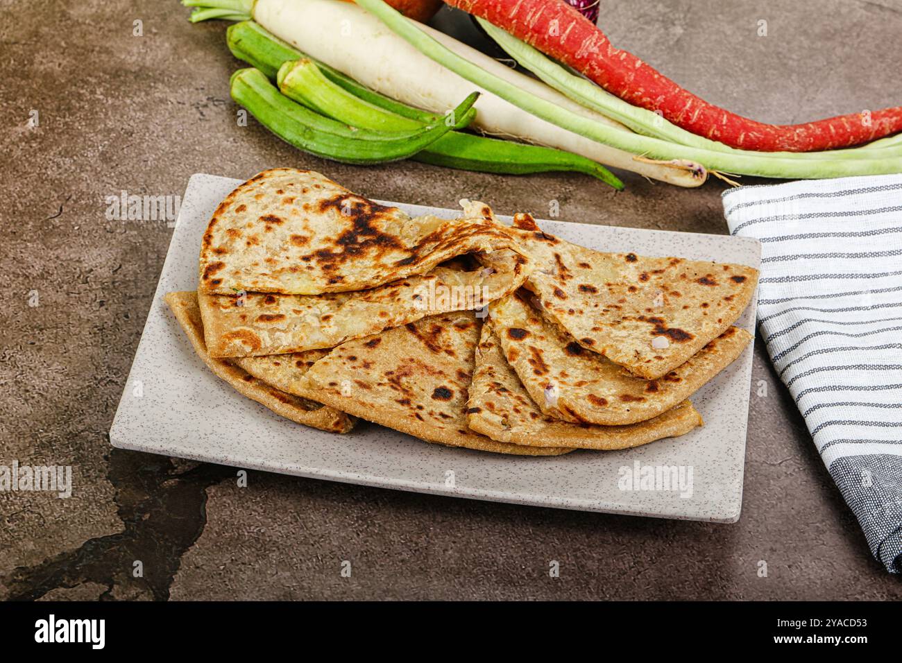 Indian vegetarian Aloo Paratha - bread with potato Stock Photo - Alamy