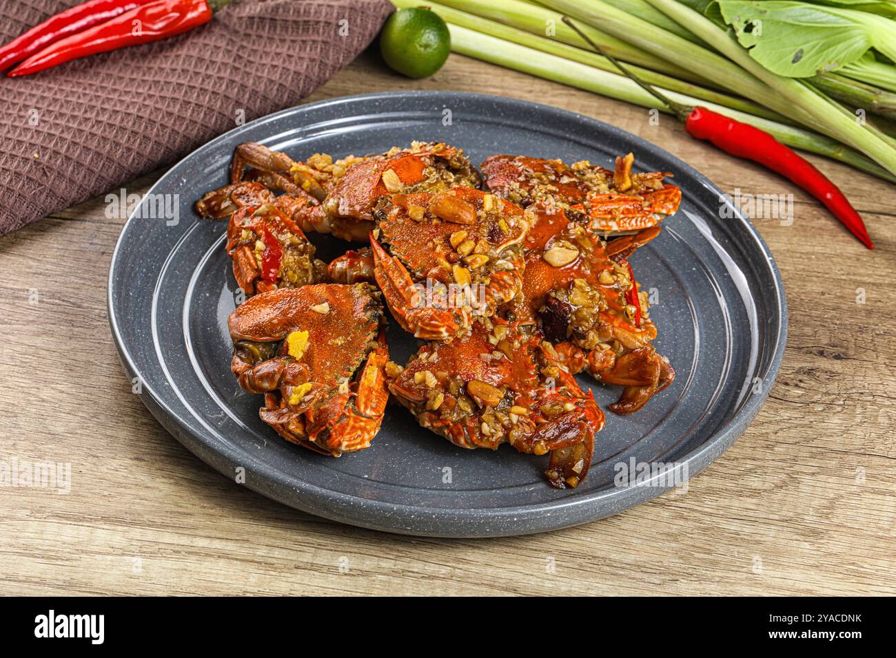 Tasty Steamed Spider crab Claws in tamatind sauce Stock Photo - Alamy
