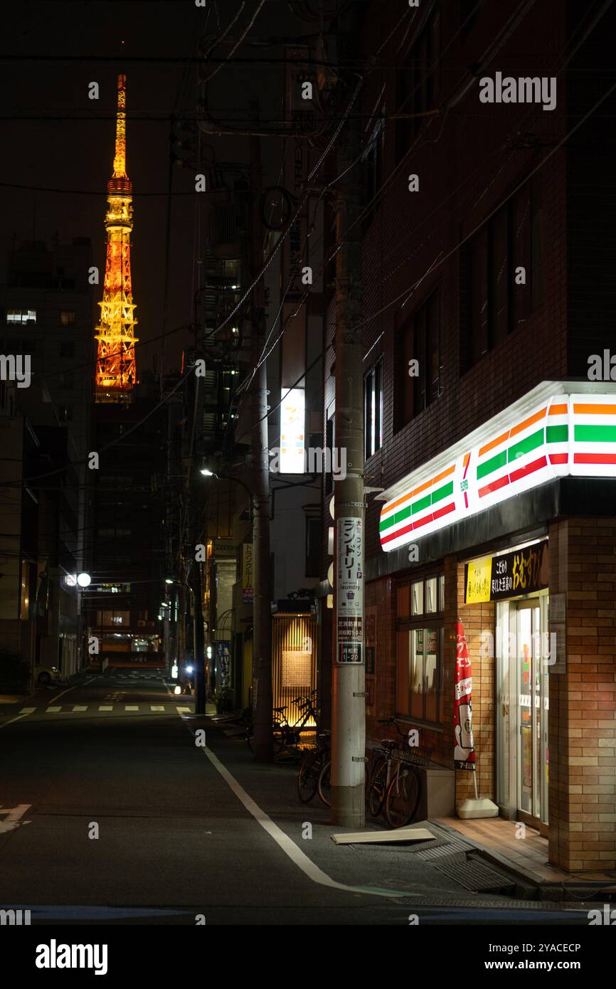 Street view of Tokyo with Tokyo Tower at background Stock Photo - Alamy