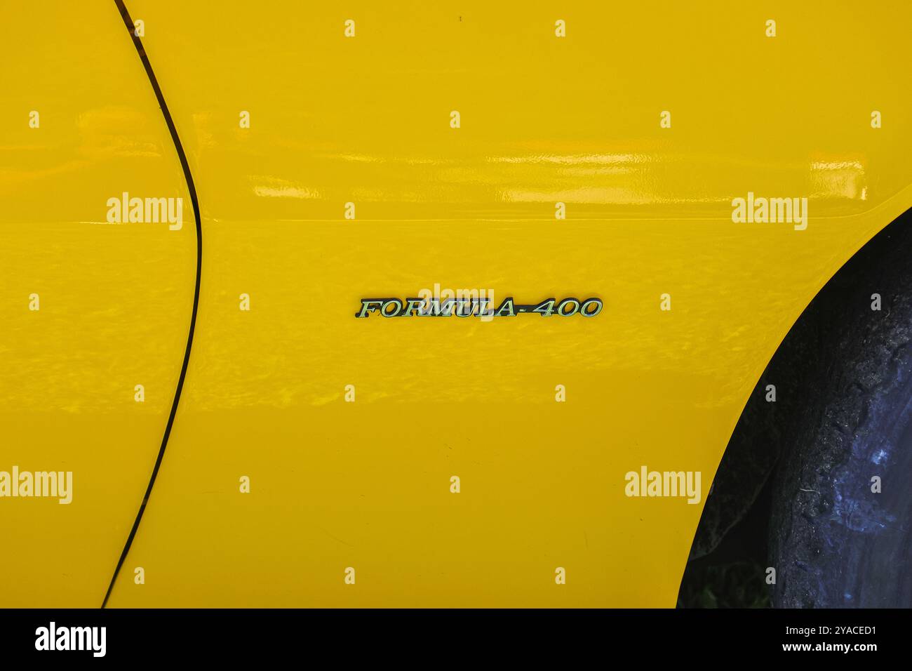 Close up of the formula 400 logo shining on the side of a bright yellow ...