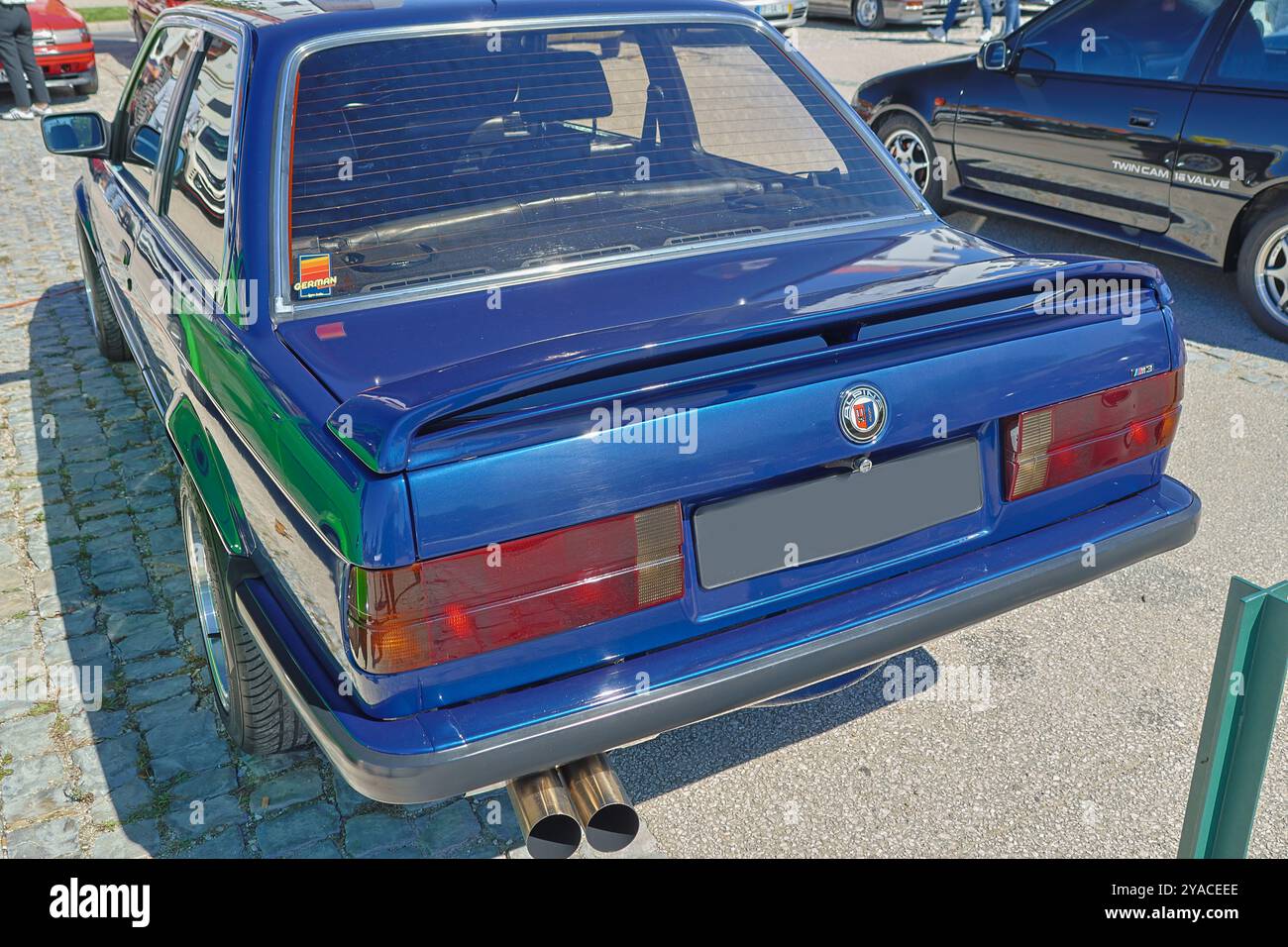 Stylish blue bmw 3 series e30 parked up on display at a classic car ...
