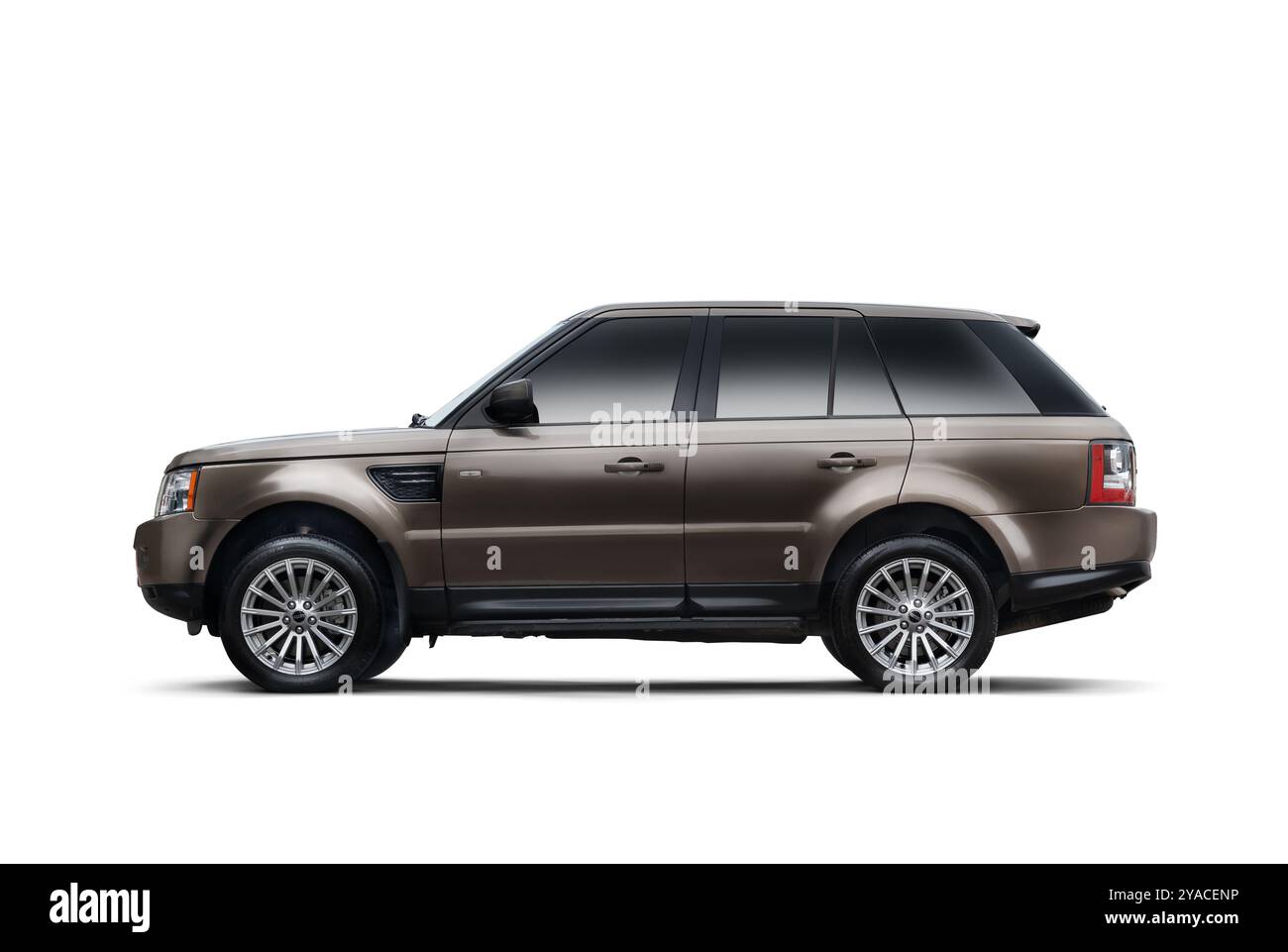 Moscow, Russia - Aug 19 2024: Full left side view of a 2009 brown Land ...