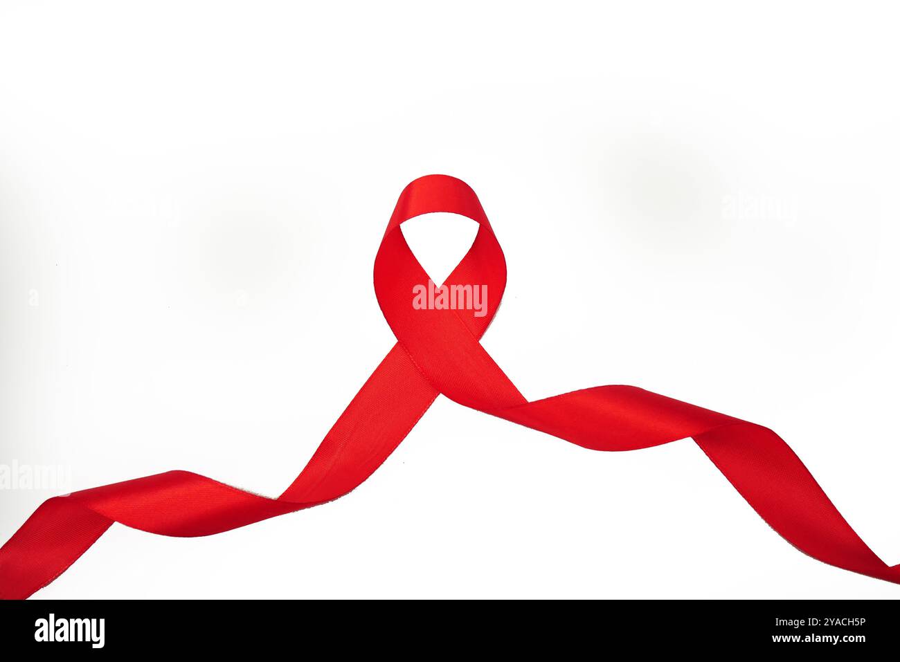red aids Awareness ribbon with copy space Stock Photo - Alamy