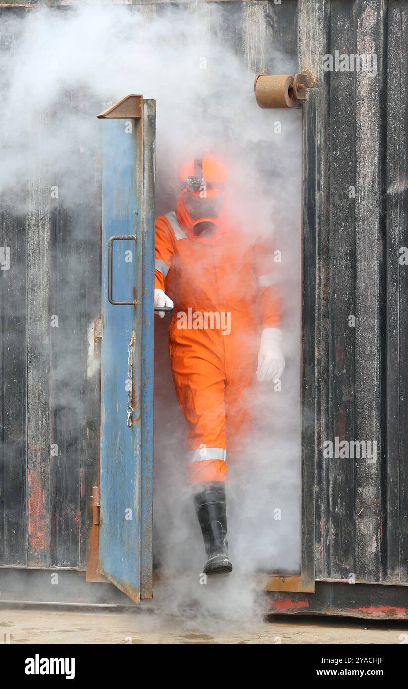 People doing enclosed and confined space fire training Stock Photo - Alamy