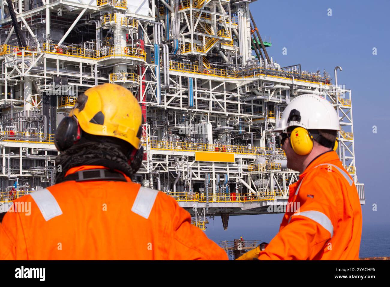 Oil and gas workers, on an oil rig Stock Photo - Alamy