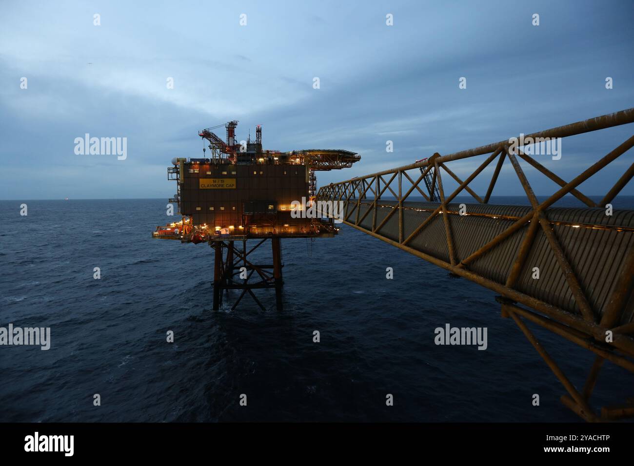 North sea oil rig at night Stock Photo - Alamy