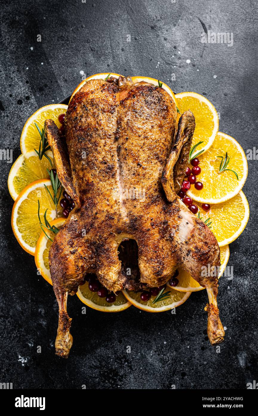 Christmas dinner, baked duck with rosemary and oranges, crispy whole ...