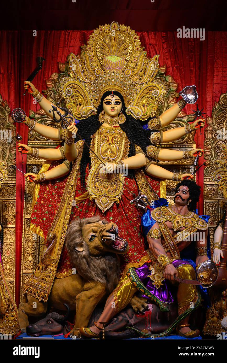Idol of Goddess Devi Durga at a decorated puja pandal in Kolkata, West Bengal, India. Durga Puja ...