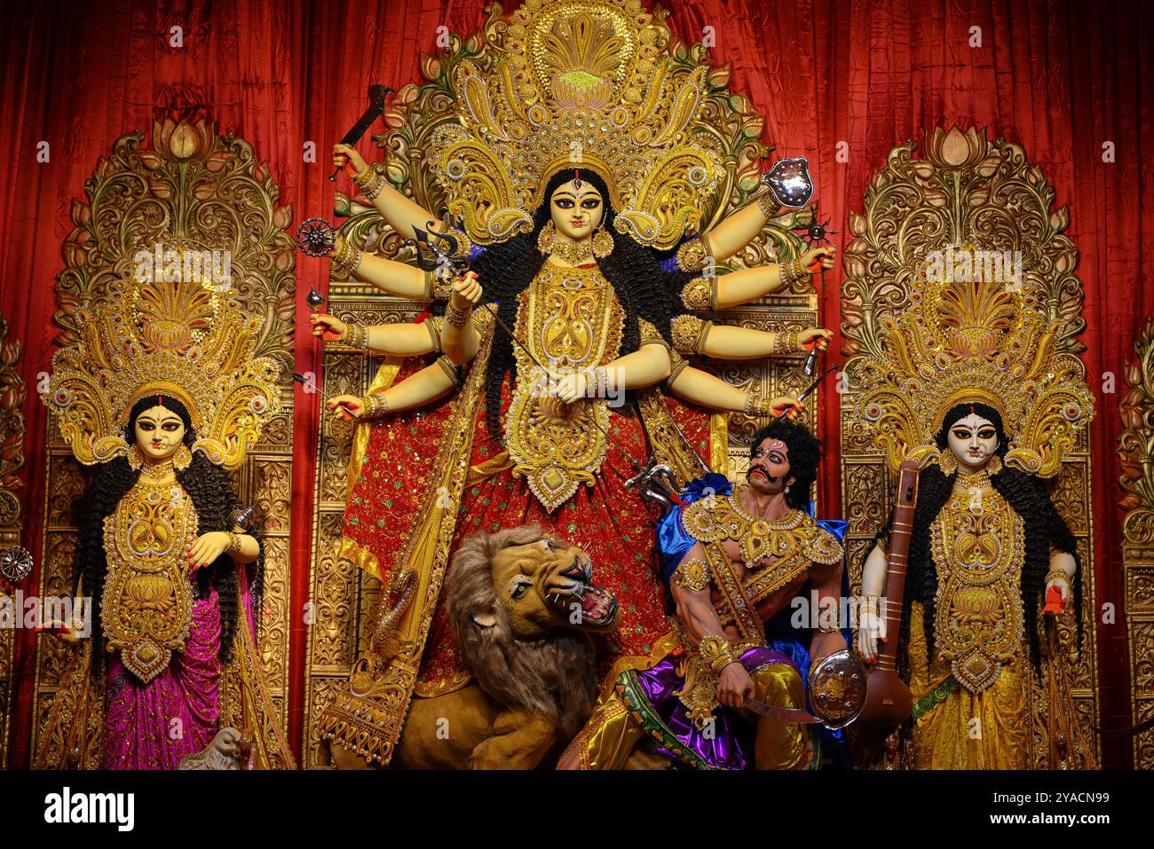 Idol of Goddess Devi Durga at a decorated puja pandal in Kolkata, West Bengal, India. Durga Puja ...