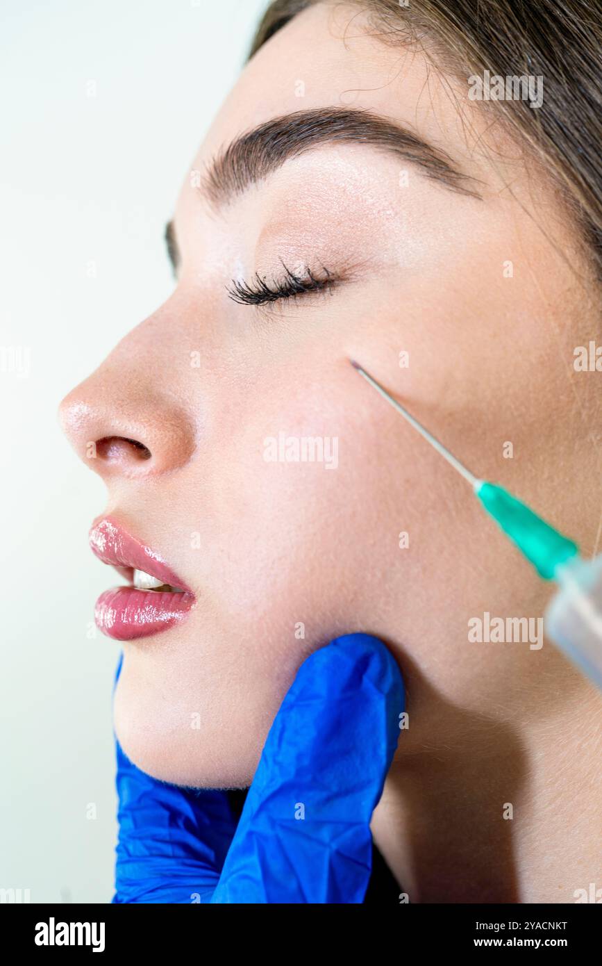Face lift gloved hands hi-res stock photography and images - Alamy