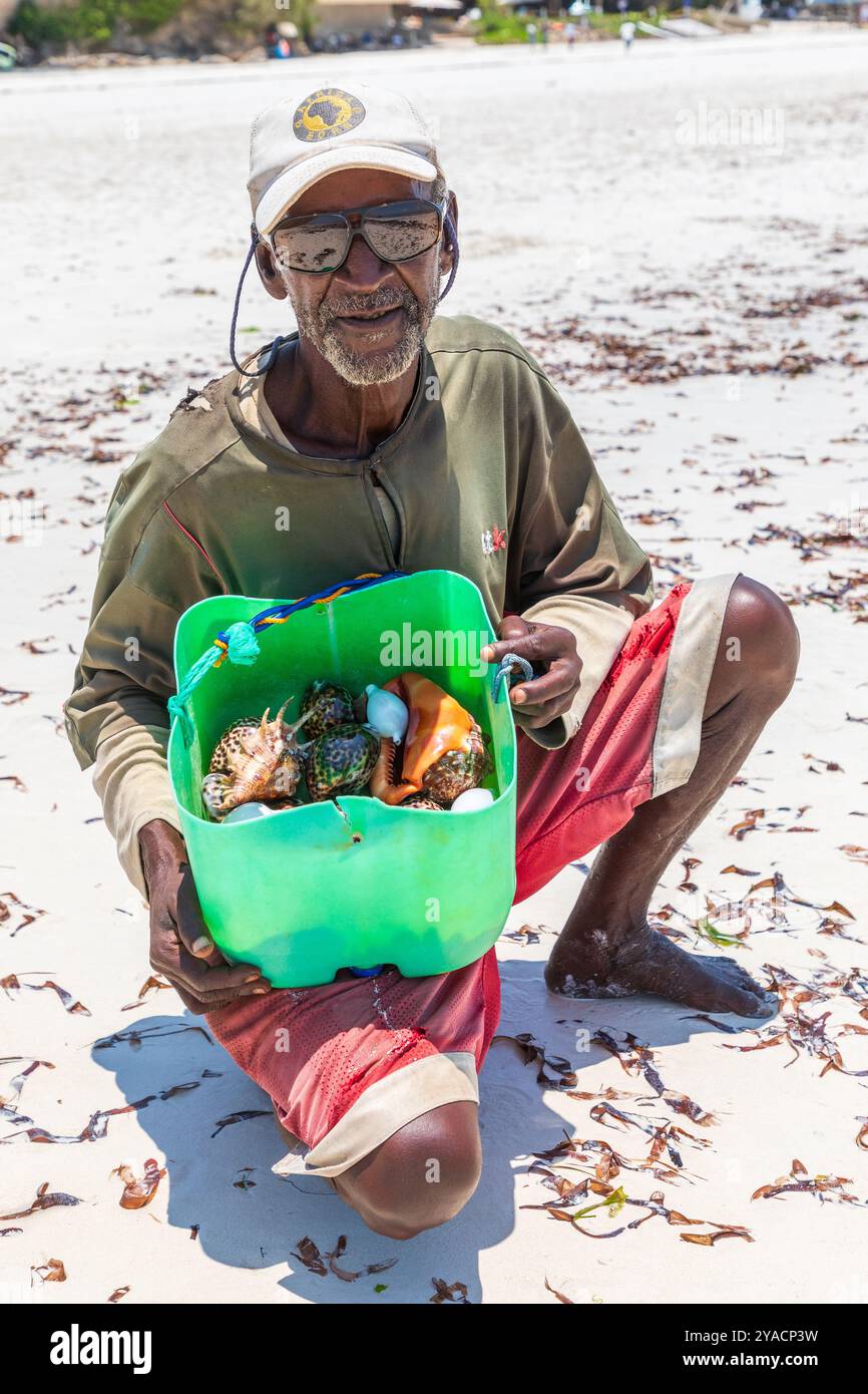 Local man selling sea shells on Diani Beach on the Indian Ocean, , Galu ...