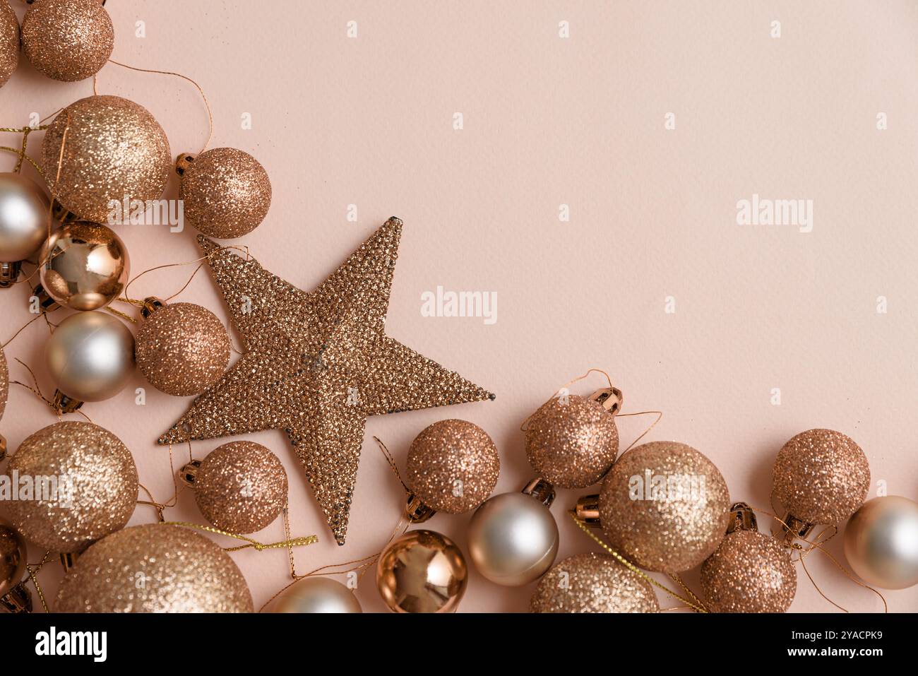 Beige Christmas background with golden stars and glitter ornaments ...