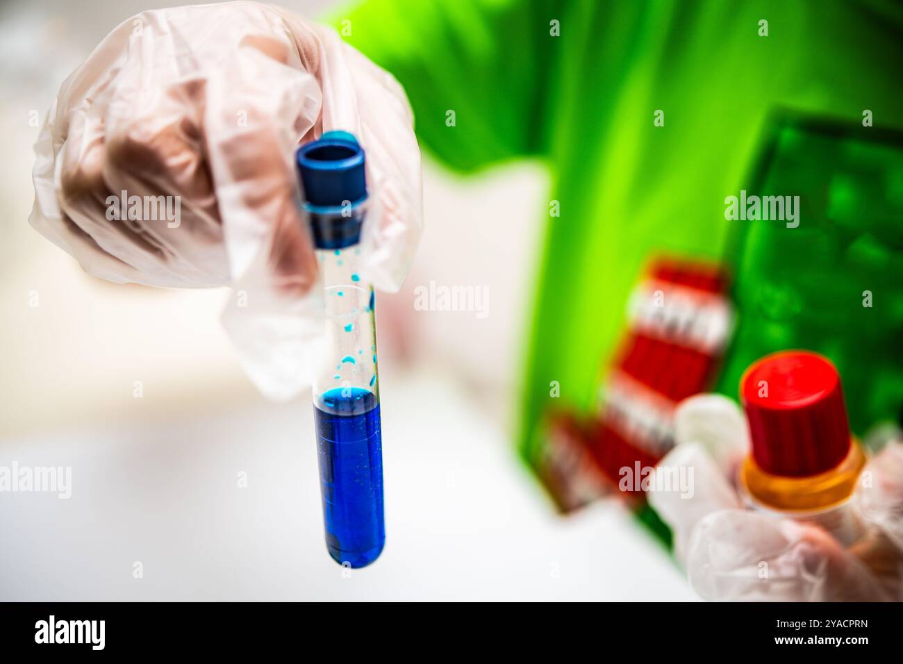 Young children excitedly experiment with colorful chemistry tubes ...