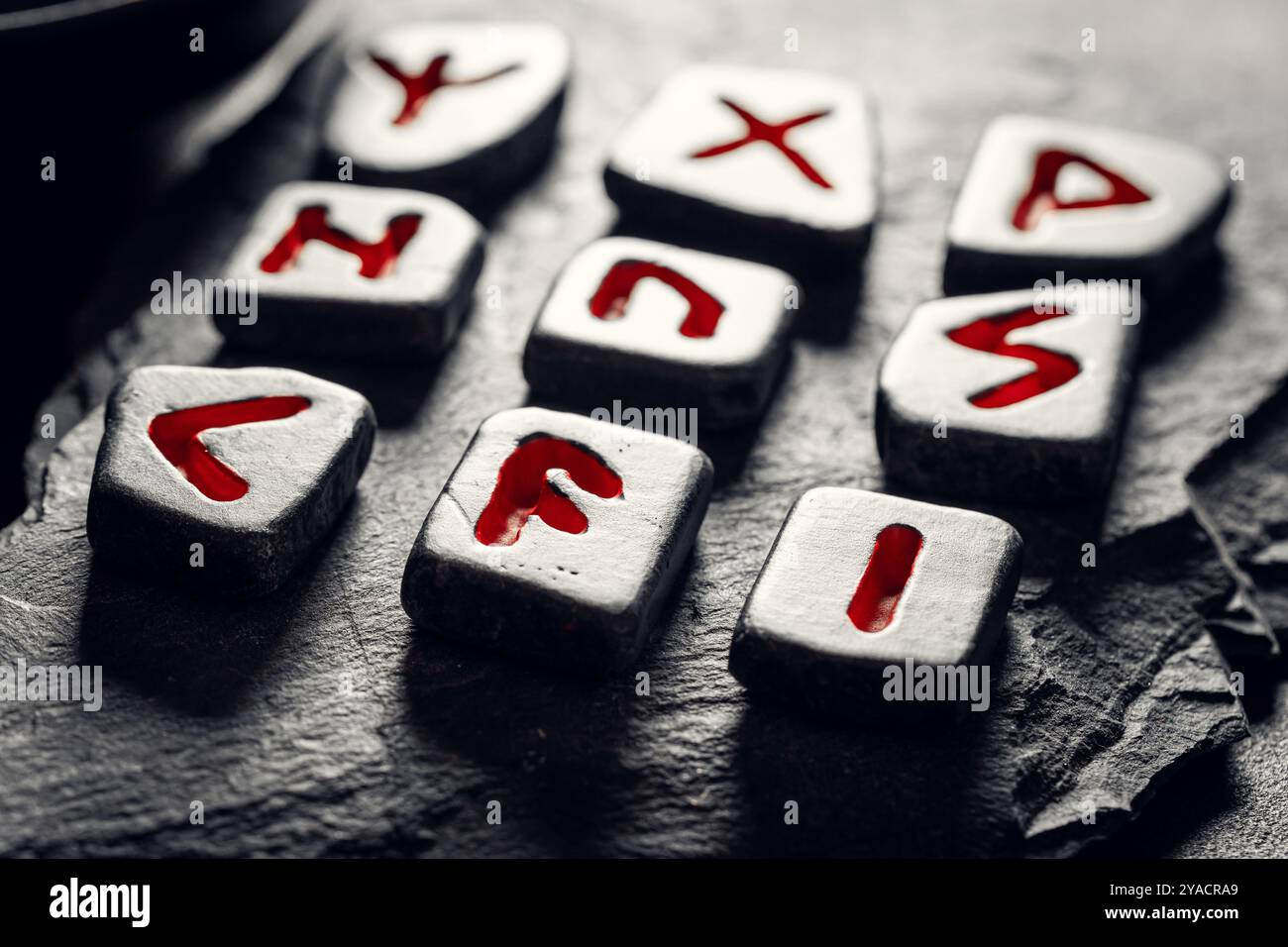 Closeup of old divination by rune stones based on antique futhark ...