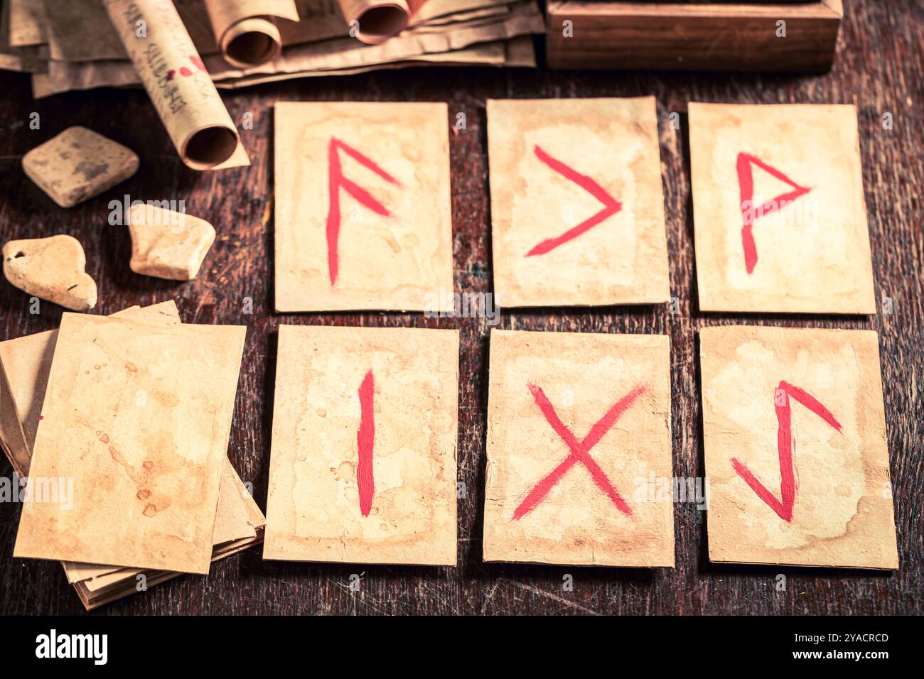 Unique runic divination by cards with futhark alphabet on wooden table ...