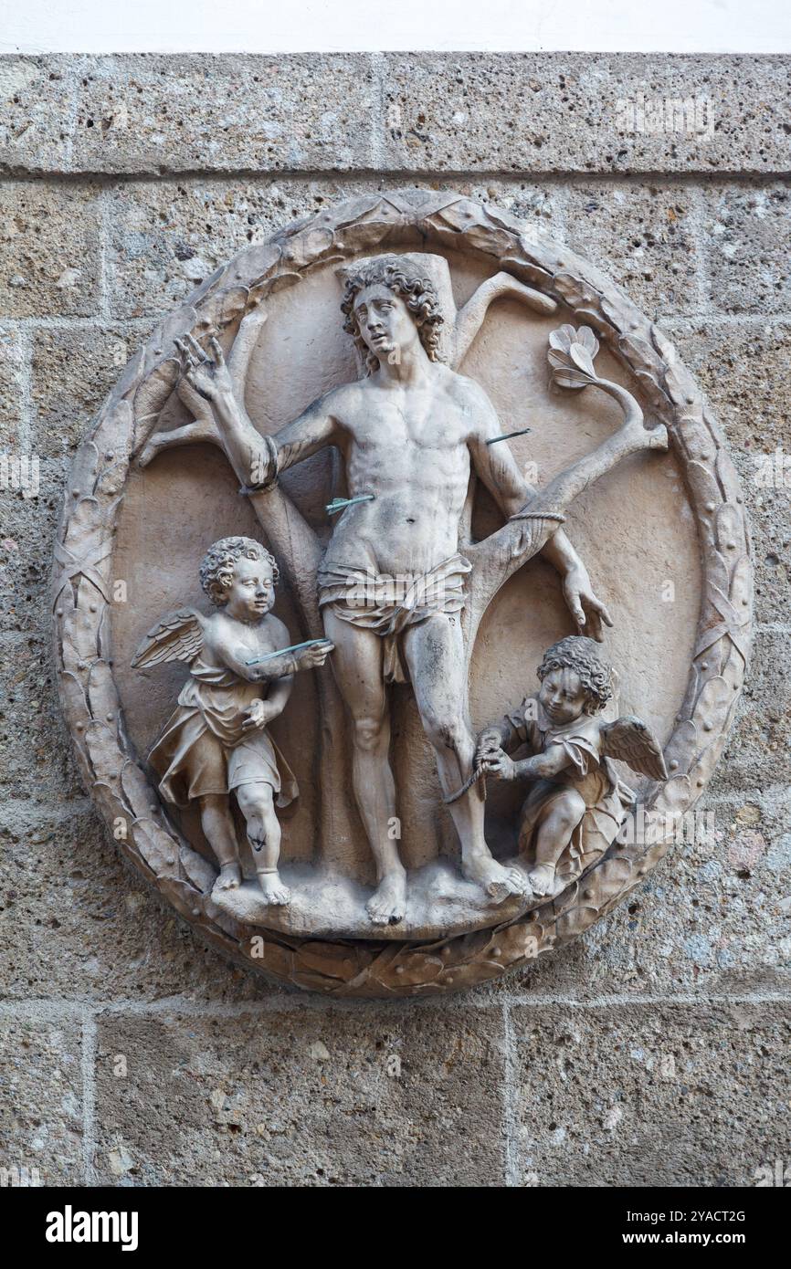 Bas relief of San Sebastianand two angels on the facade of ...