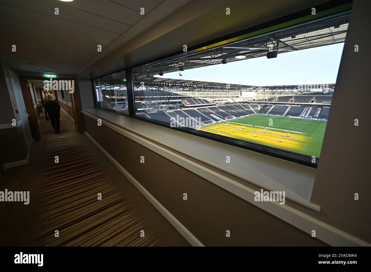Looking through a hotel corridor at the MK Dons football stadium Stock ...