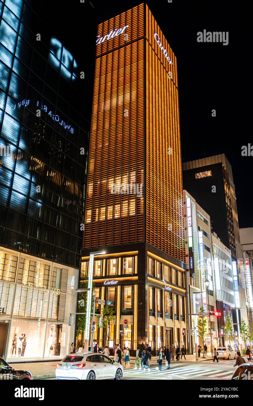 The high rise Cartier flagship store bathed in orange light on the ...