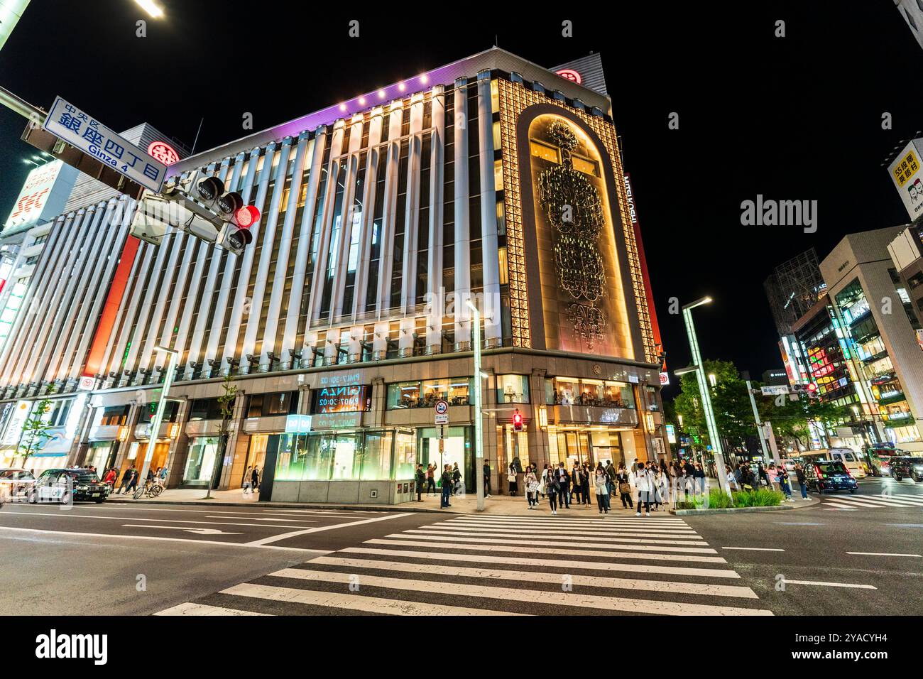 People waiting at Pedestrian crossing out side the entrance to the ...